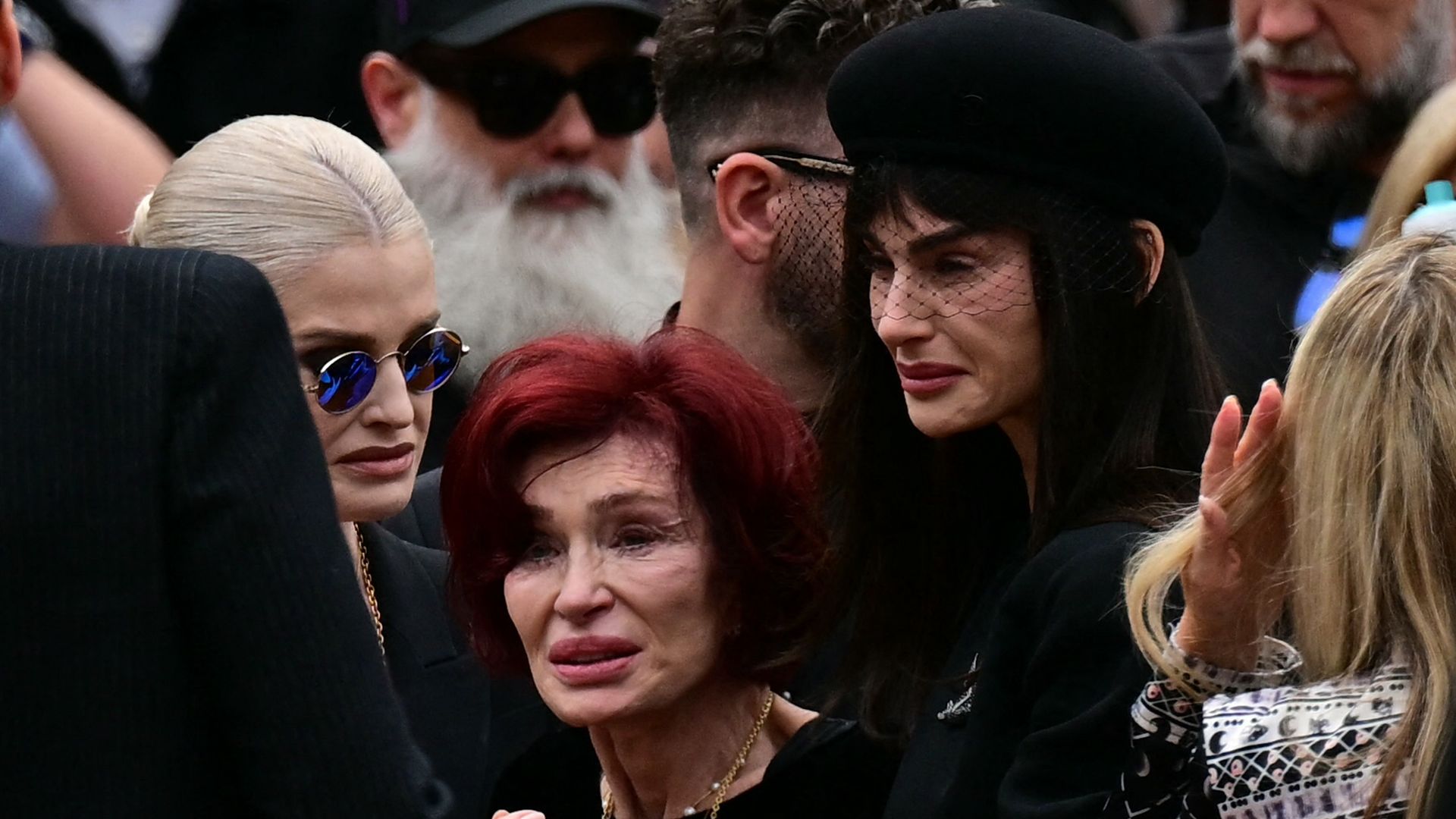 Sharon and Ozzy Osbourne's rarely-seen daughter Aimee makes tearful appearance with family at ...