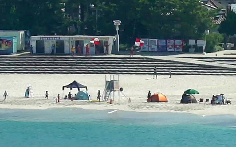 Tsunami warnings scaled back after waves crash into Japan, Hawaii and ...