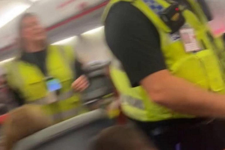 Police drag two men off Leeds Jet2 flight after 'downing bottle of ...