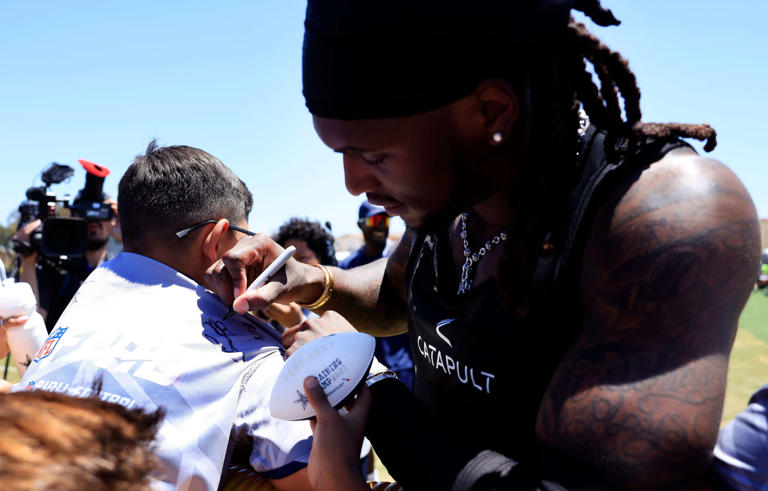Cowboys fans make presence felt with big jump in attendance at camp ...
