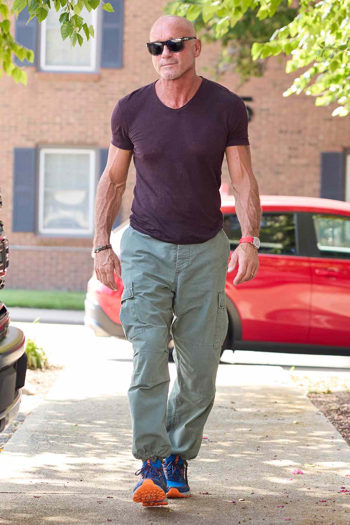 Tim McGraw Shows off Newly Shaved Head (and Ripped Muscles!) During ...