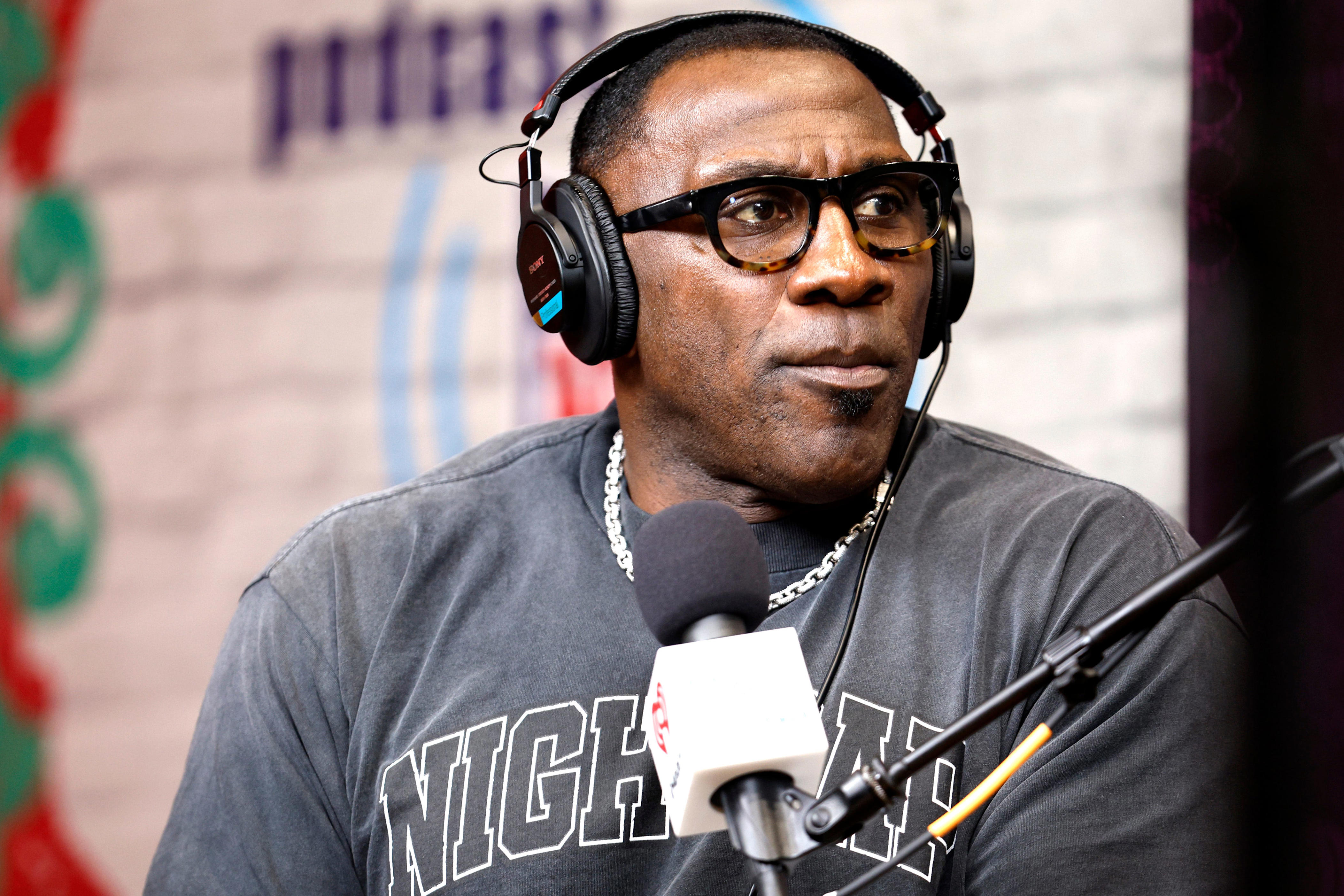 Why was Shannon Sharpe cut from ESPN after lawsuit settlement?