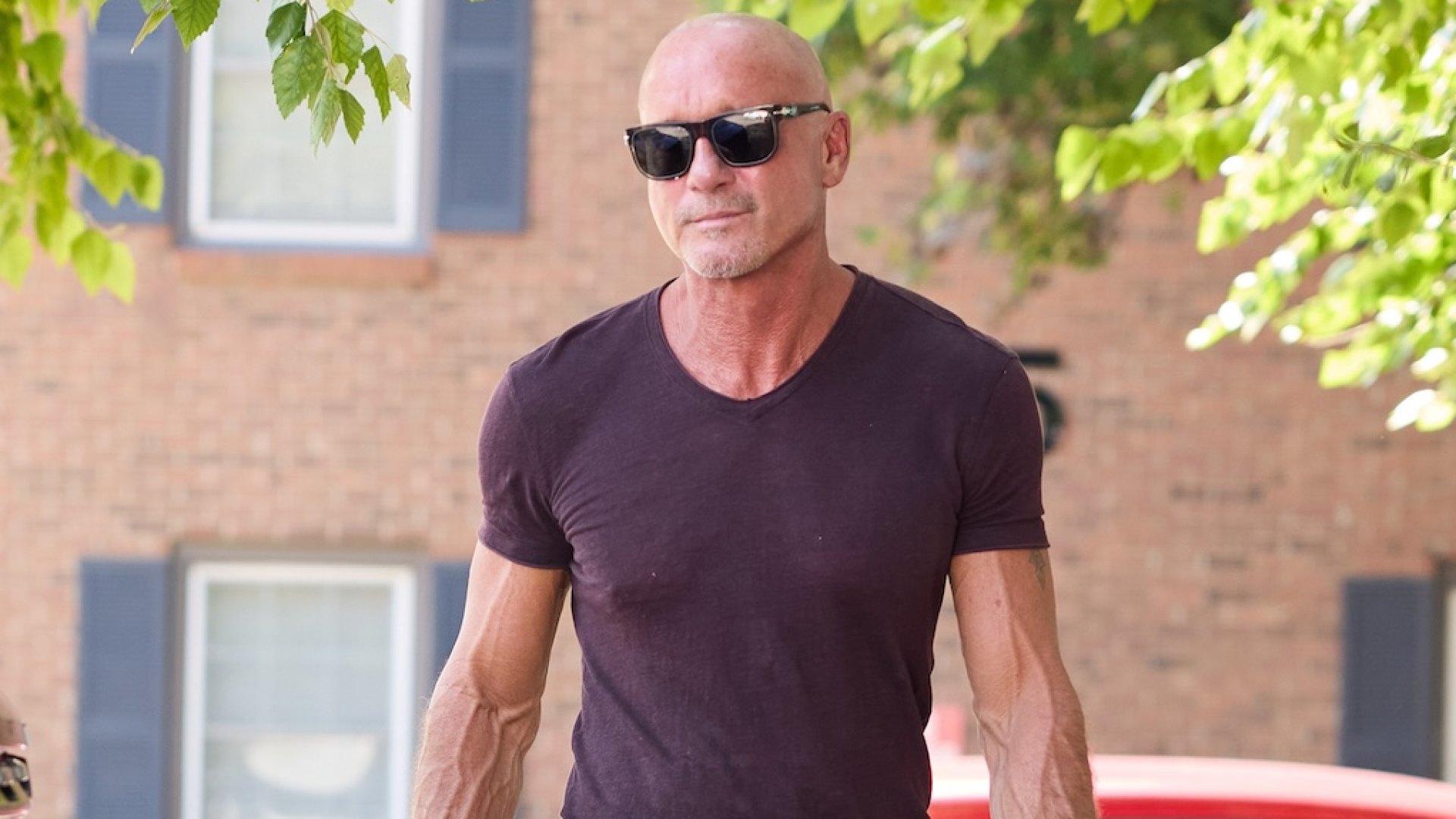 Tim McGraw Unveils Newly Shaved Head, Shows Off Ripped Muscles in Nashville