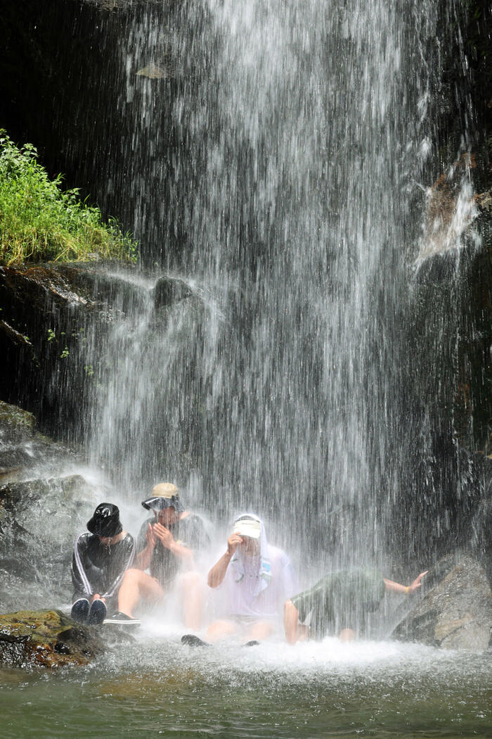 Beating heat wave at waterfall