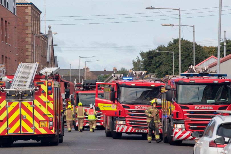 Glasgow police and firefighters battle storage unit blaze in 25 ...