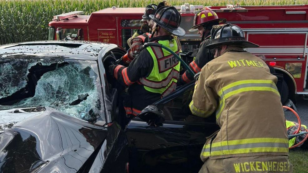 PHOTOS | Crews remove door to free person trapped by wreck in Lancaster ...