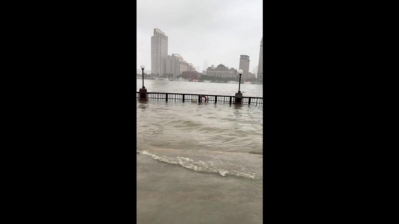 Rivers overflow flooding roads amid storm in China