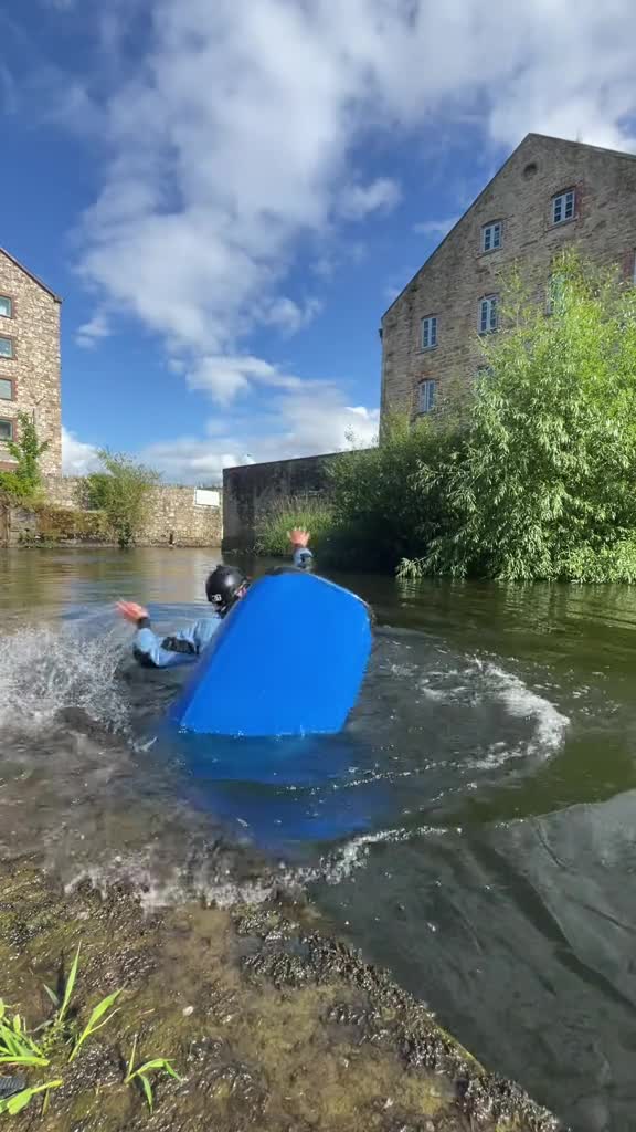Kayak Freestyle Spin Trick Along the Canal Wall