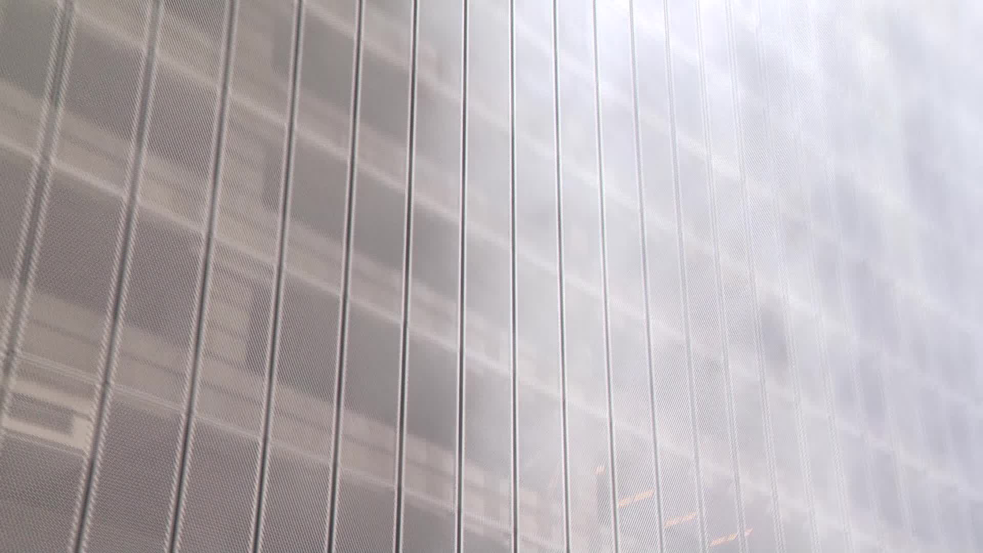 More glass panels falling from downtown building