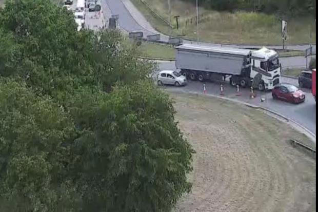 Long delays as flooding shuts part of major Essex road at roundabout