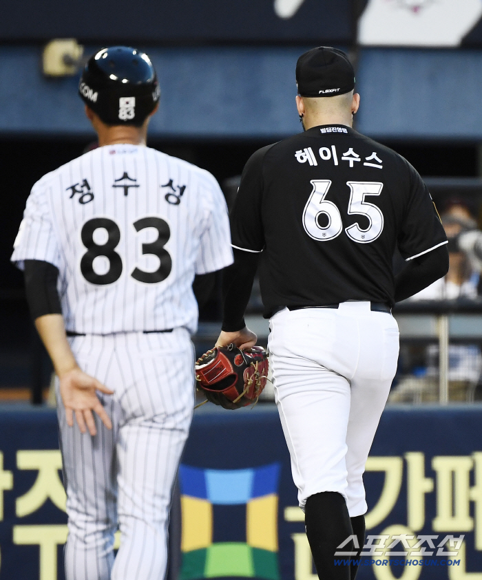 Heysus leaves with a head shot of a fastball