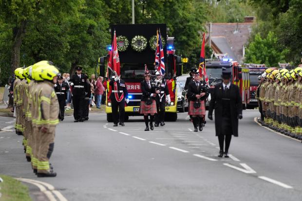 Hundreds line streets as funeral procession honours firefighter killed ...