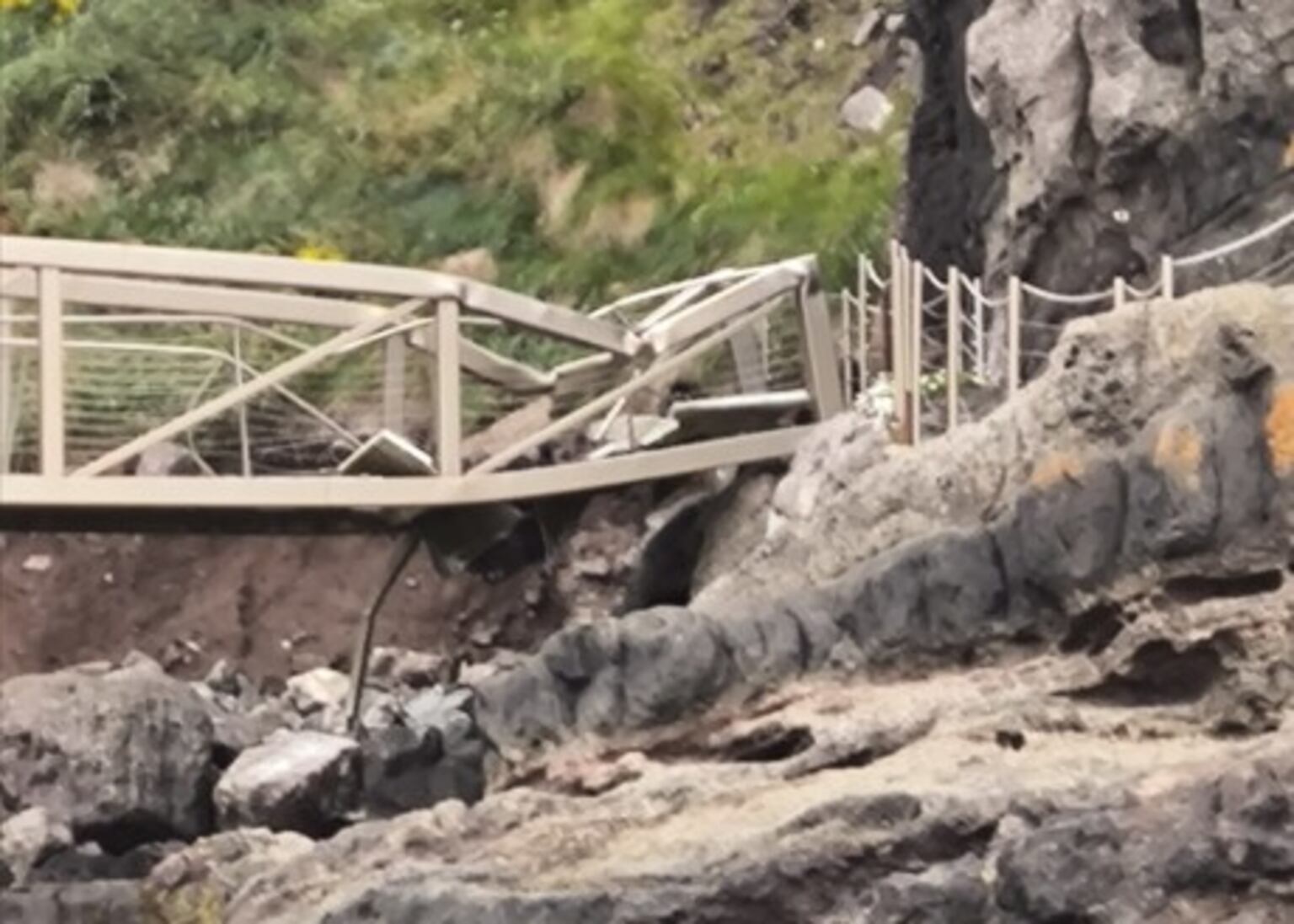 Pictures show rockfall damage that has led to ongoing Gobbins closure