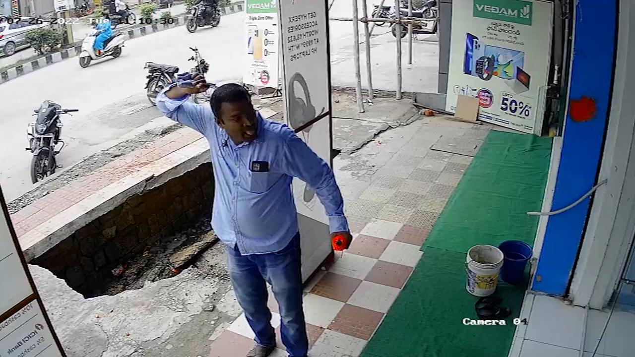 Passerby narrowly escapes footpath collapsing over covered canal