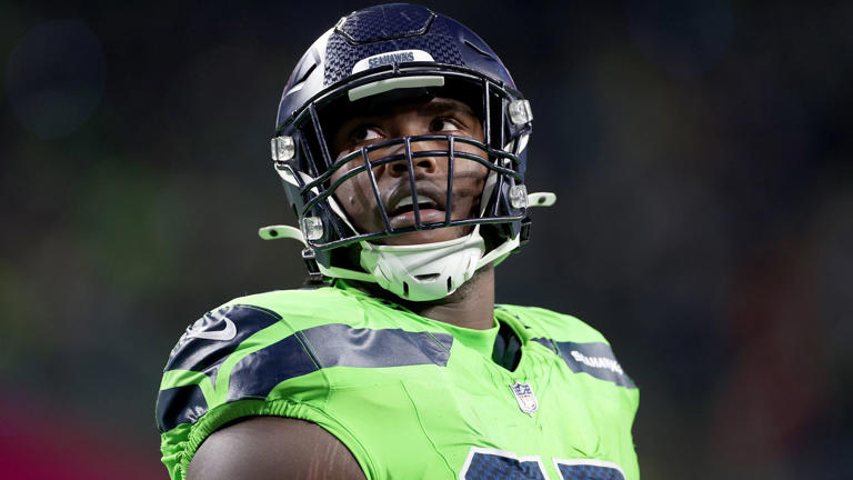 Who started on the Seahawks o-line with Charles Cross out