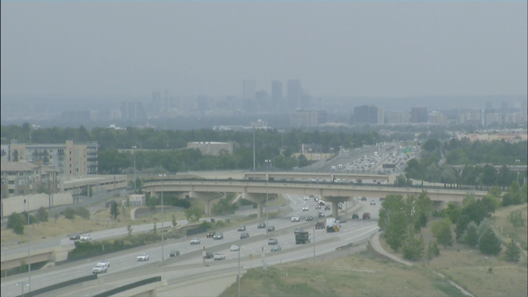 Wildfire smoke spreads across Colorado, impacting air quality and causing hazy skies