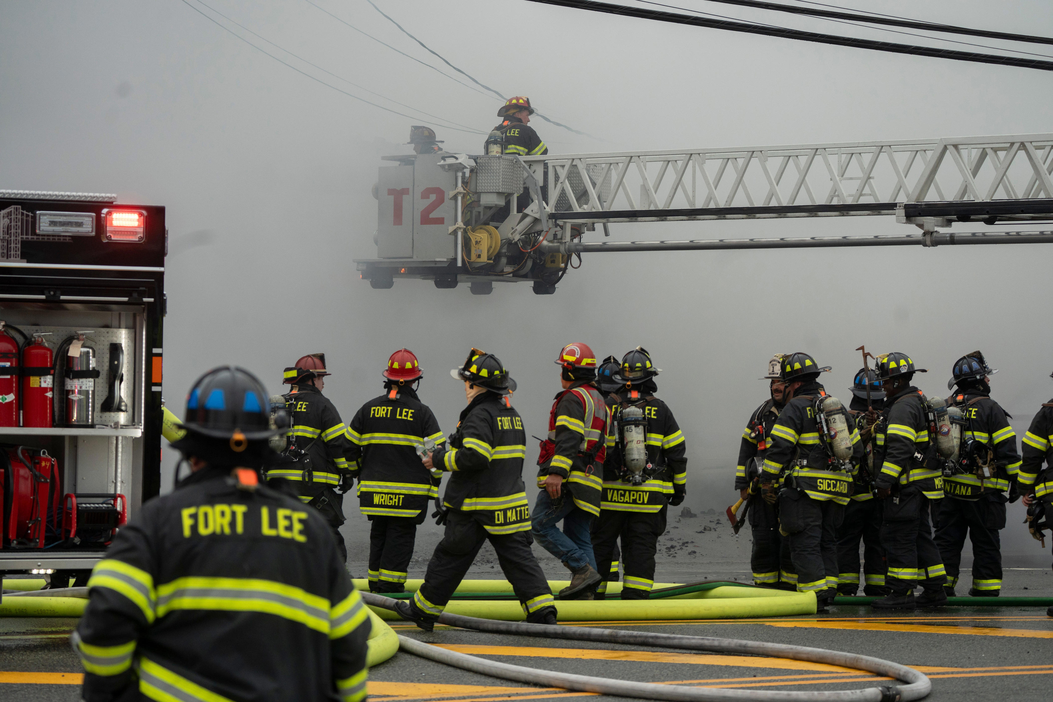 Three-alarm blaze at auto mechanic garage in Fort Lee leaves ...