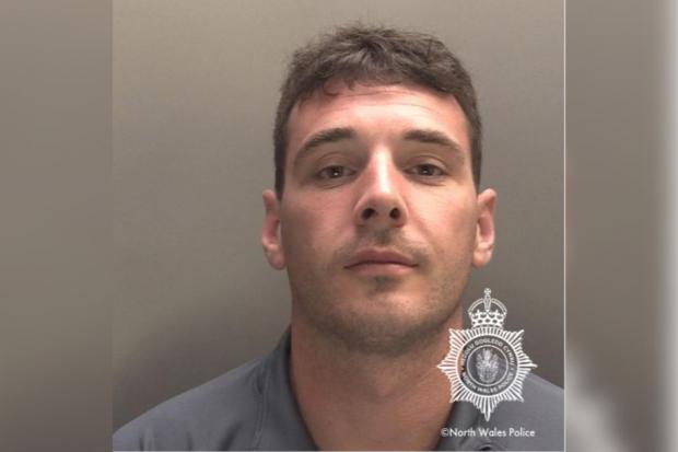 Driver who "dangerously" crashed into motorcyclist in Flintshire is jailed