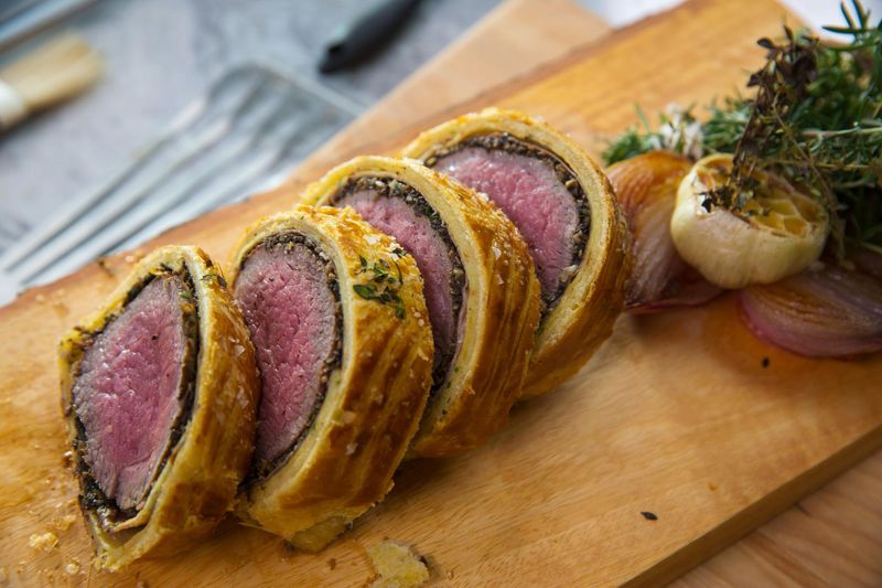 15 Celebrity Chefs And The Signature Dishes They're Famous For