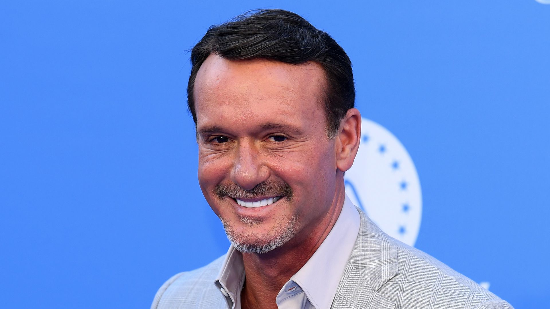 Tim McGraw reveals reason behind unrecognizable bald head transformation