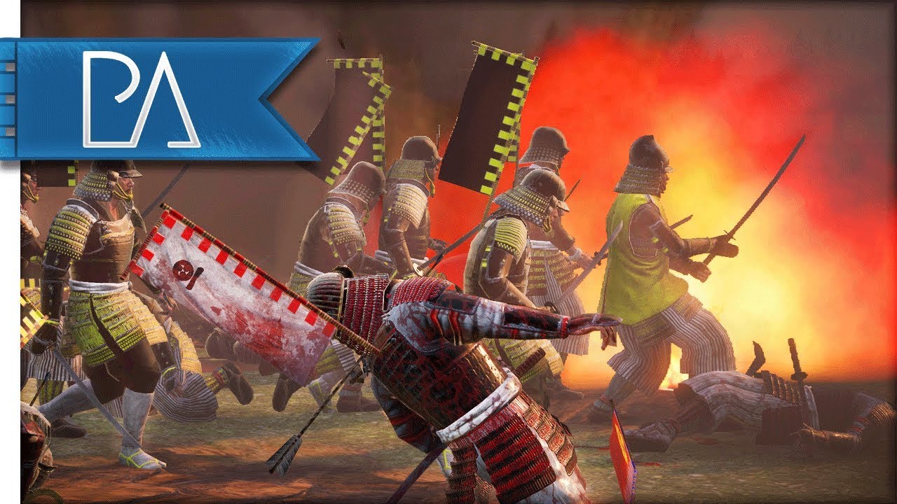 Samurai Charge Through Fire and Flame in Total War Siege Battle