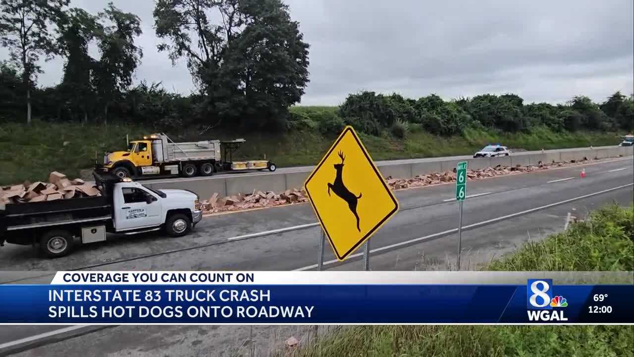 4 injured after tractor-trailer crash spills thousands of hot dogs on I-83