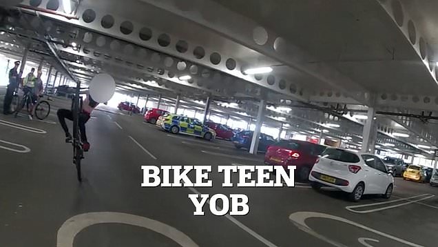Teen yob deliberately rides his bike into a police officer