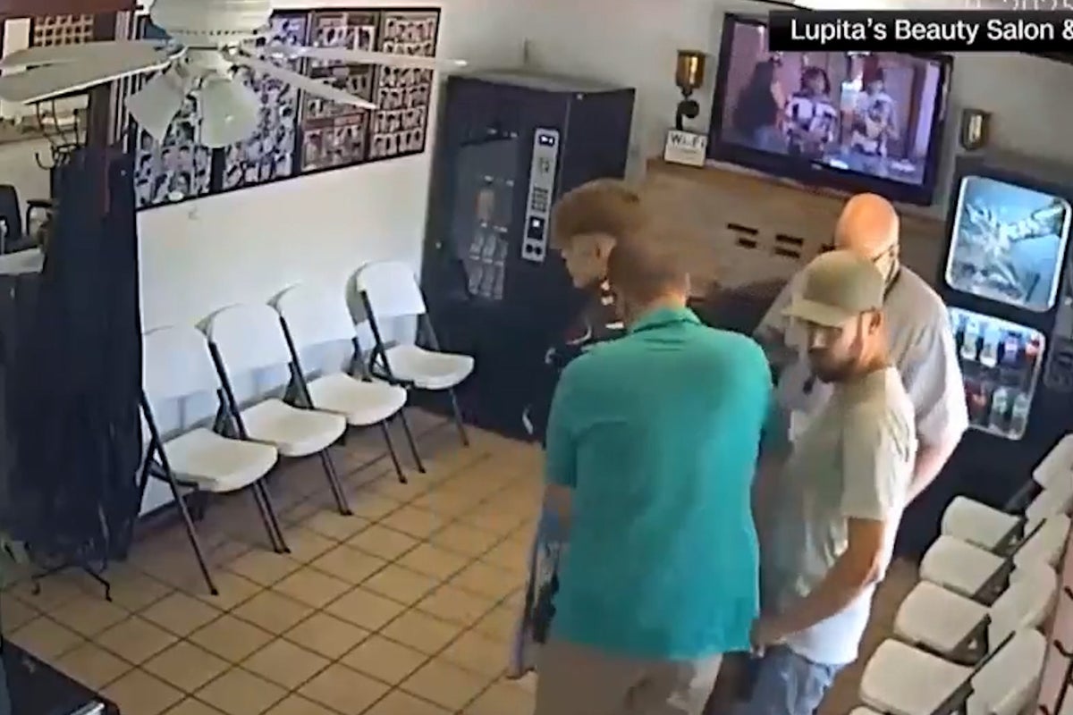 Teacher accused of killing Arkansas couple seen getting arrested at barber shop before admitting ...