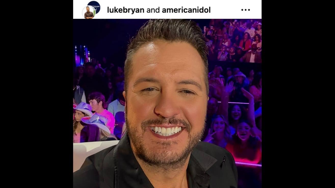 Luke Bryan responds after someone threw a ball at his face while on stage