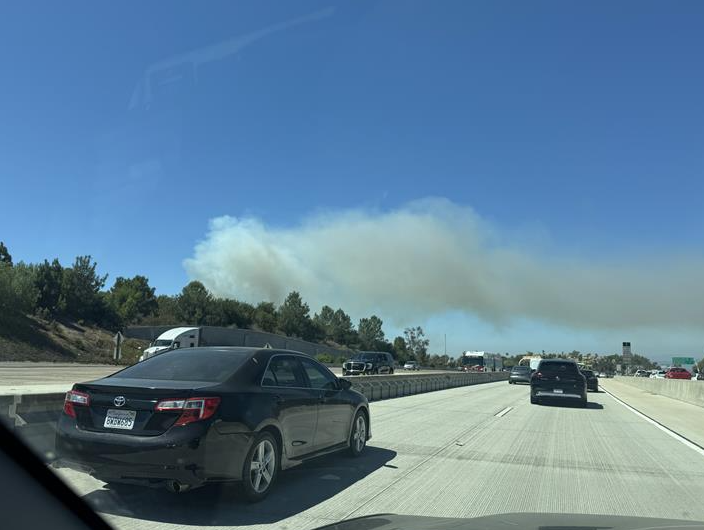 Evacuation warning lifted after brush fire burns near homes in Rancho ...