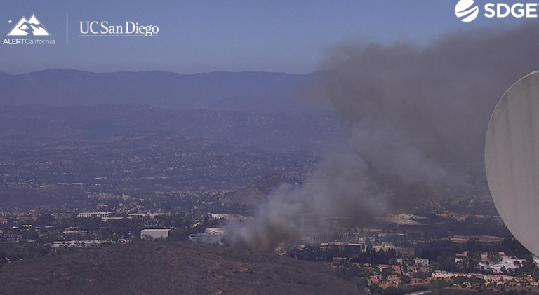 Evacuation warning lifted after brush fire burns near homes in Rancho ...