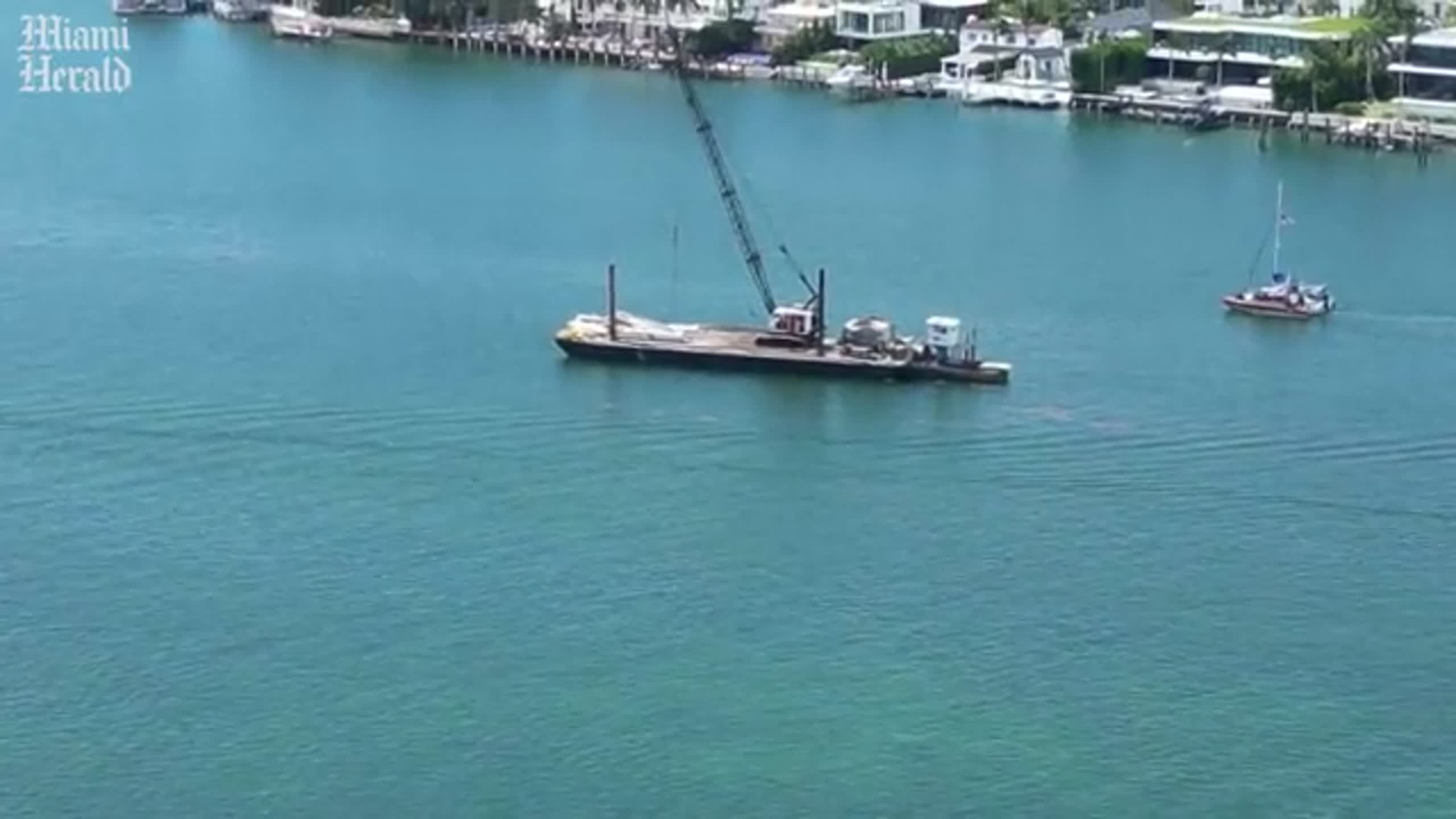 Drone footage shows barge involved in sailboat accident