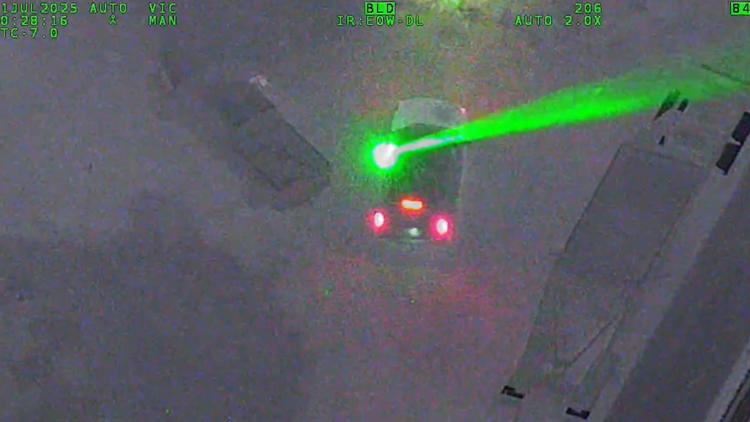 Suspect caught on camera targeting aircraft with laser