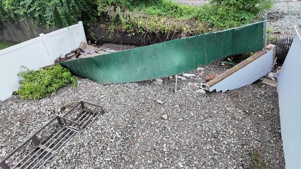 Queens residents cleaning up after flooding caused damage, commute problems