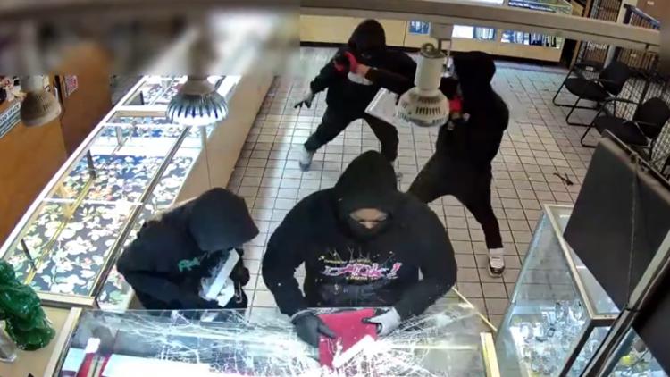 Masked thieves pull off smash-and-grab robbery at jewelry counter ...