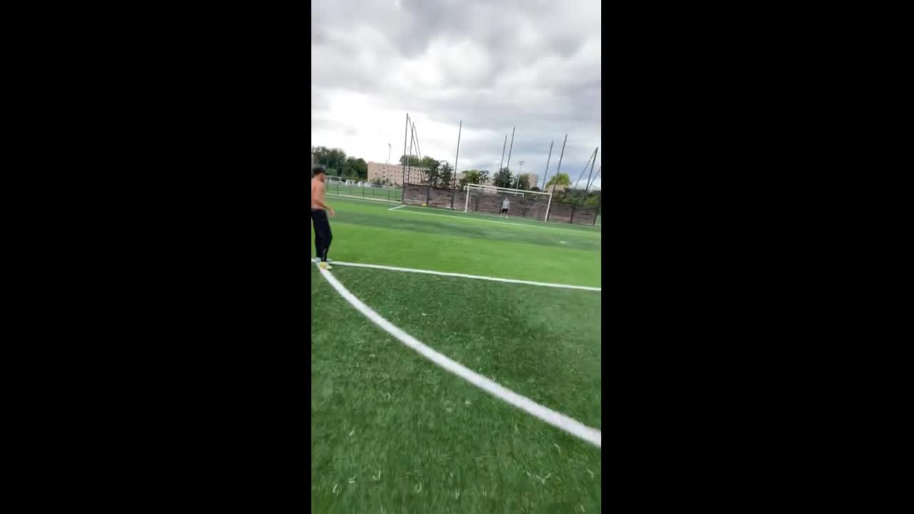 Man slips after kicking football in Paris, France