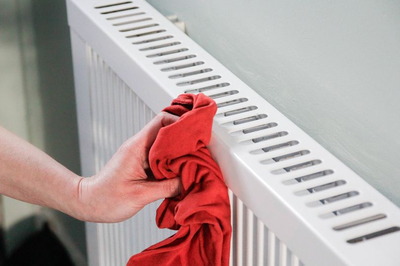 Eliminate dust from behind radiators using item you probably already own
