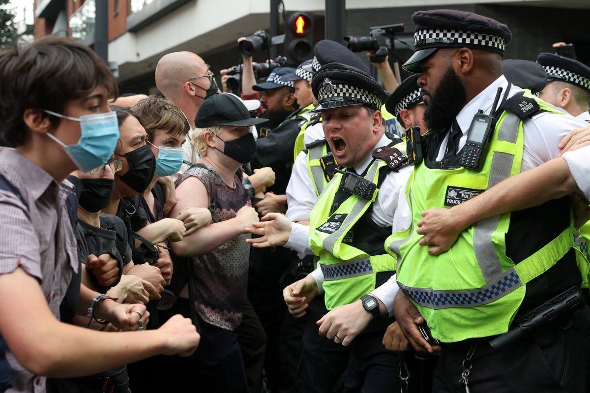 Rival groups clash at protest outside London asylum hotel