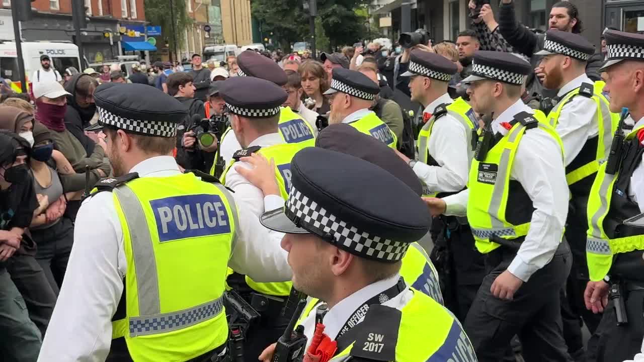Police charge pro asylum demonstrators at Islington Hotel London