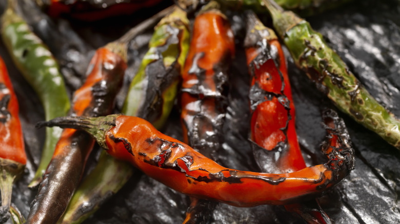 The Four Worst Foods For Acid Reflux, According To Our Gastroenterologist