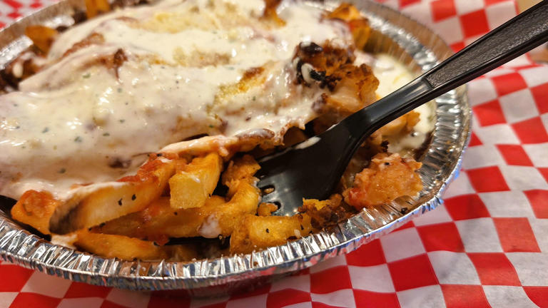 This ‘house divided’ is about pizza, wings and burgers, not Bama vs. Auburn