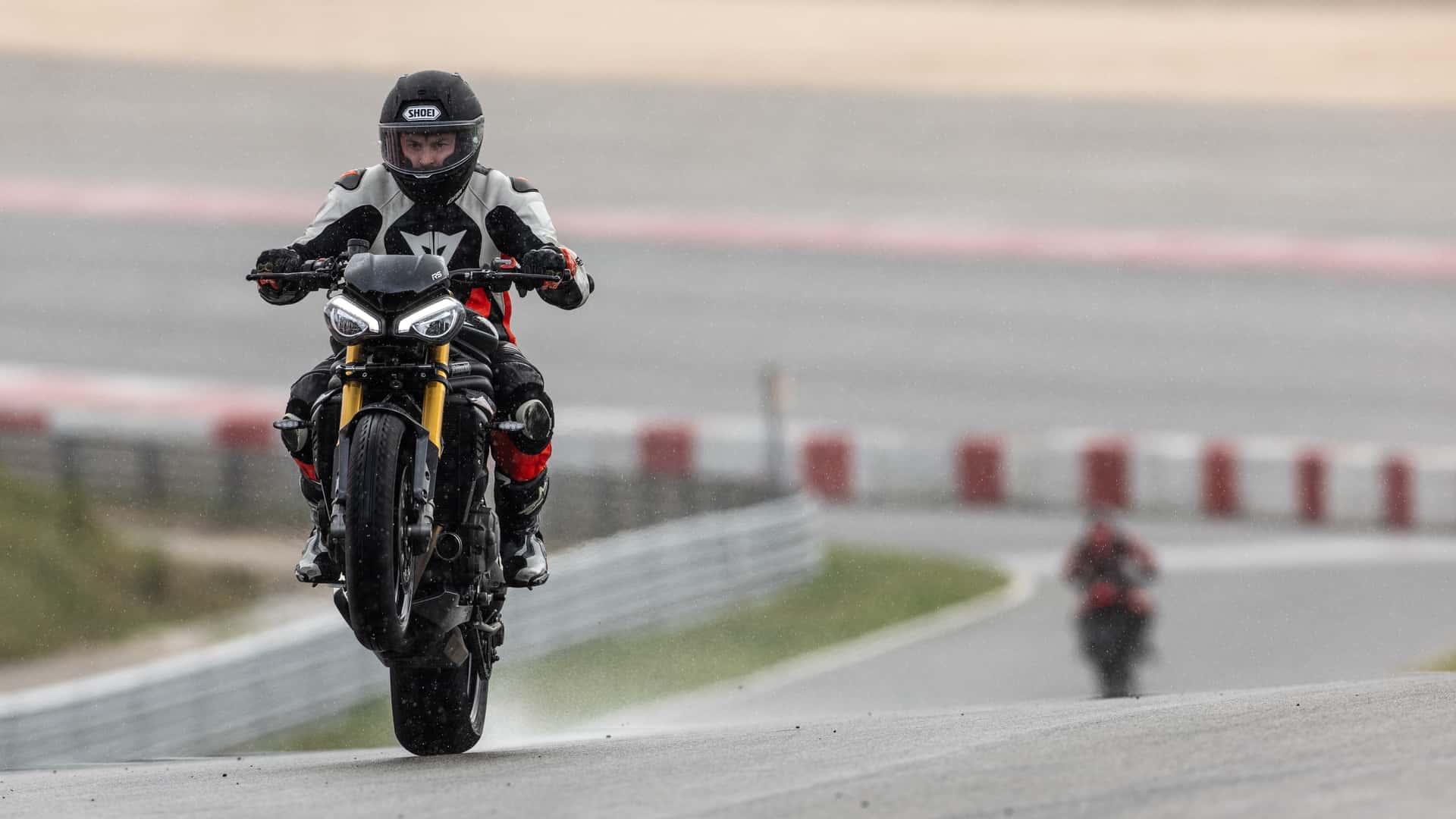 Triumph's Wheelie Control System Turns You Into a Hooligan With a ...