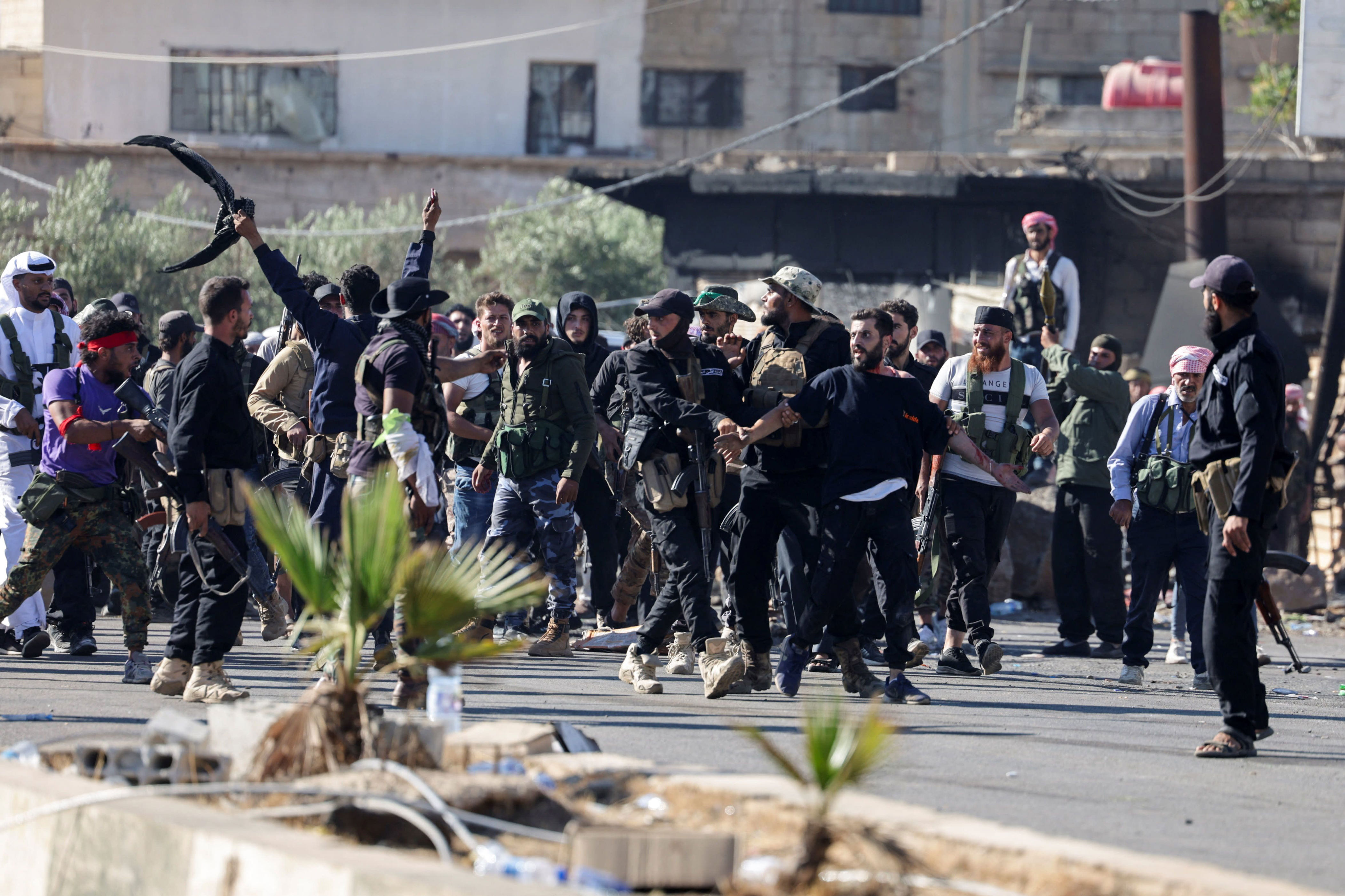 Syria's defense ministry and Kurdish-led SDF trade blame over attack in ...