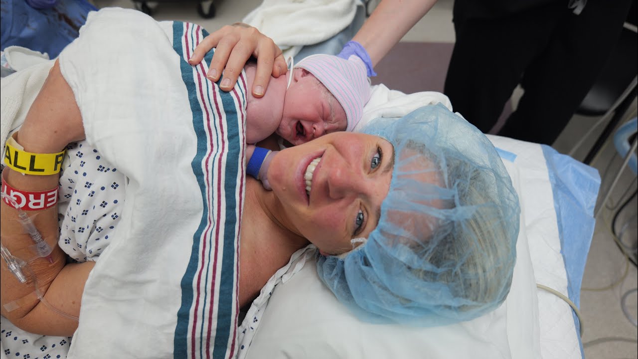 Live birth of first daughter captured in raw delivery