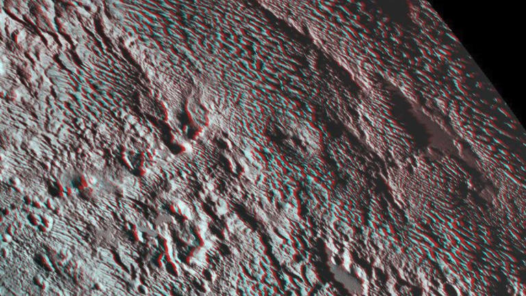 Skyscraper-size spikes of methane ice may surround Pluto's equator