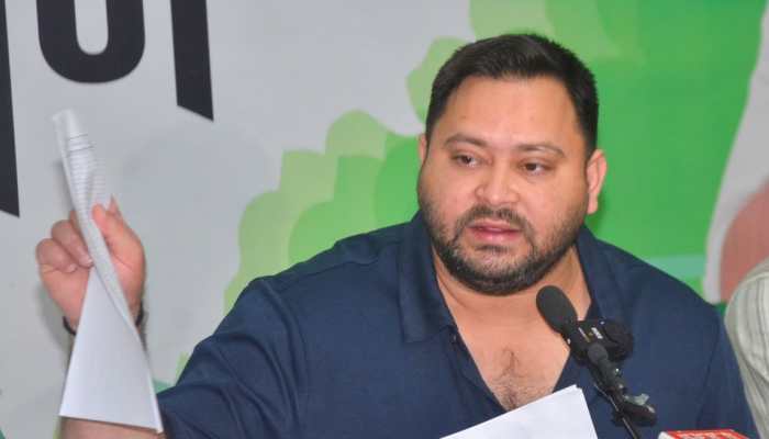 BJP IT Cell Chief Malviya Exposes Tejashwi Yadav's Multiple Voter IDs ...