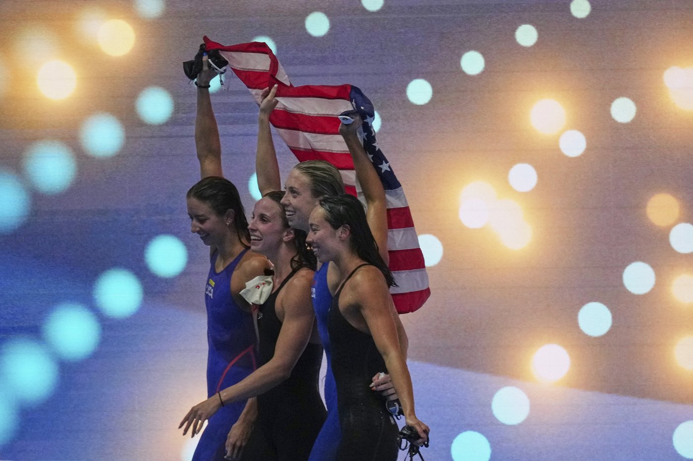 Americans finish strong with a relay world record in the swim worlds to ...