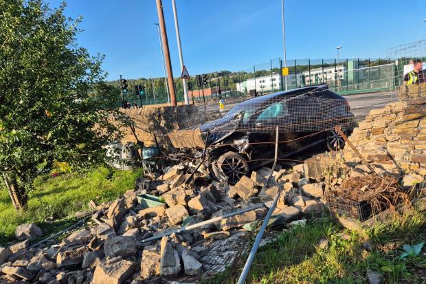 Car 'smashed like fury' into wall near school leaving the structure ...