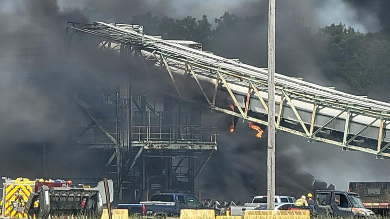 Fire crews gain the upper hand on Domtar paper mill fire in wood yard