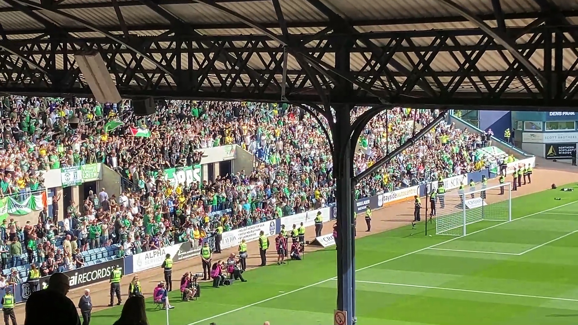 Hibs fans celebrate victory at Dundee